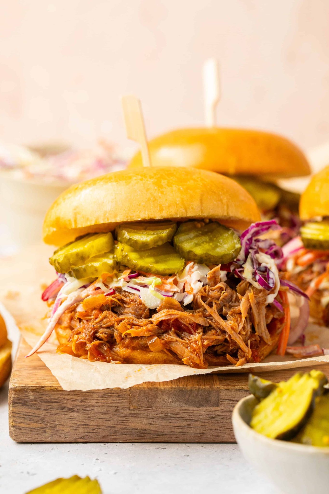 The Best Saucy Pulled Pork Burgers (Slow Cooker or Oven)